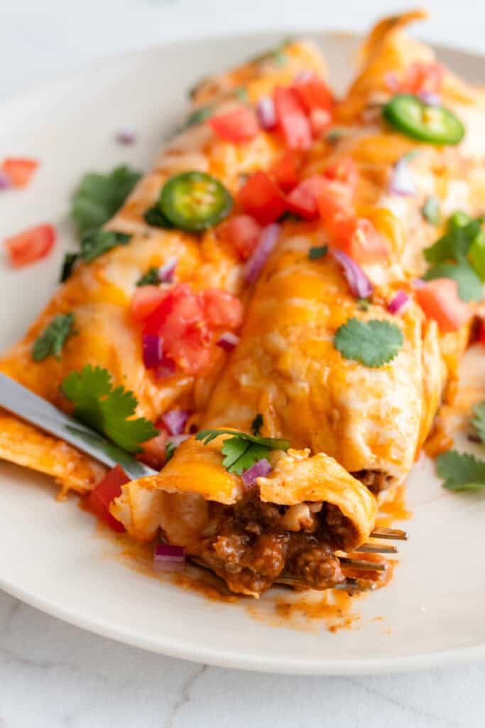 Easy Beef Enchiladas Recipe - Farmhouse on Boone
